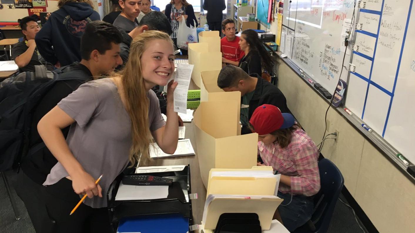 Students cast their votes for Clinton and Trump in school mock ...